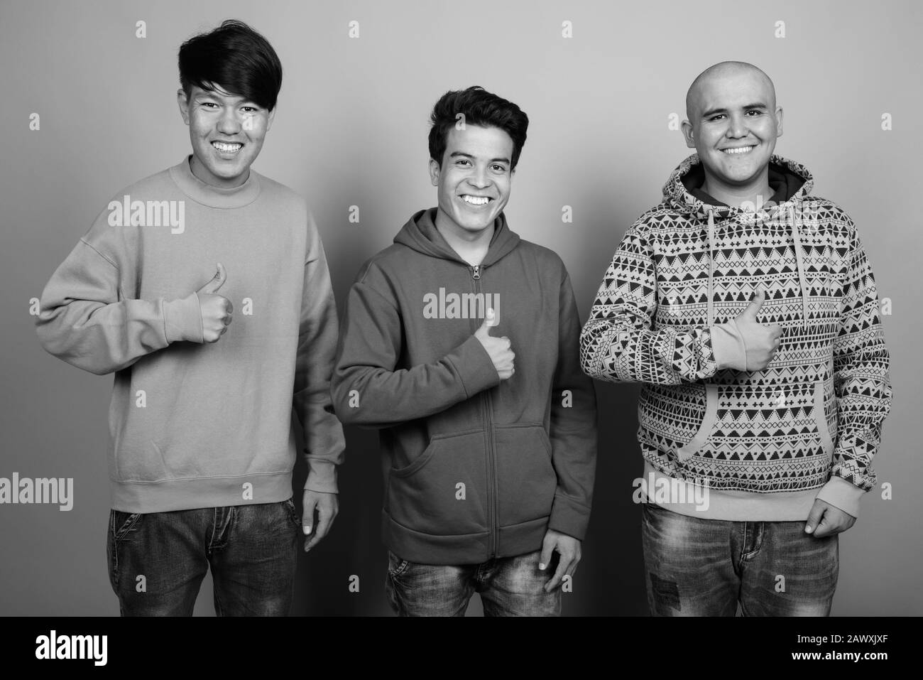 Portrait of three young Asian men together Stock Photo - Alamy
