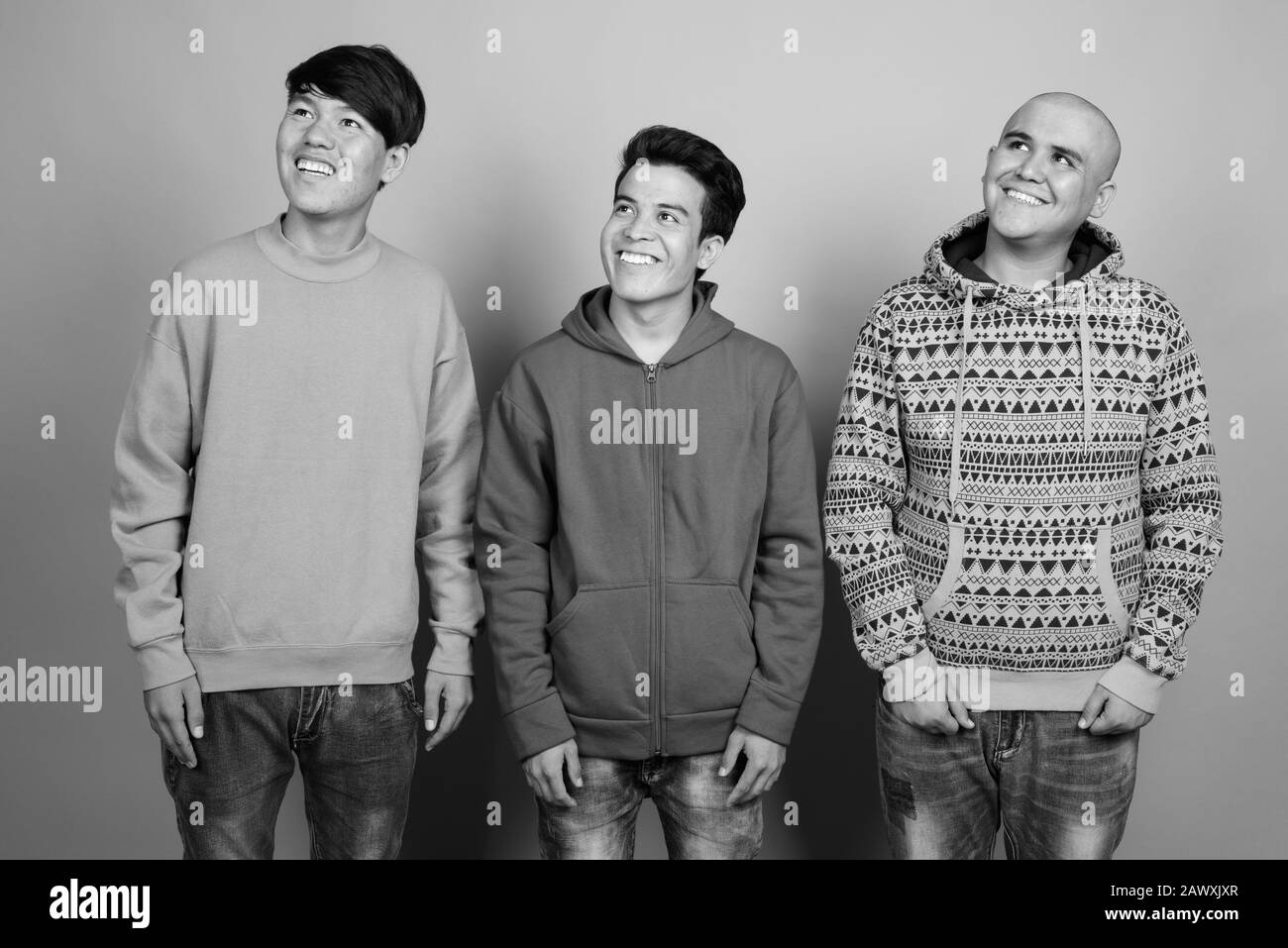 Portrait three happy male hi-res stock photography and images - Alamy