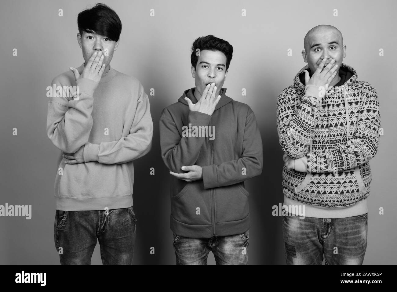 Three asian young men Black and White Stock Photos & Images - Alamy