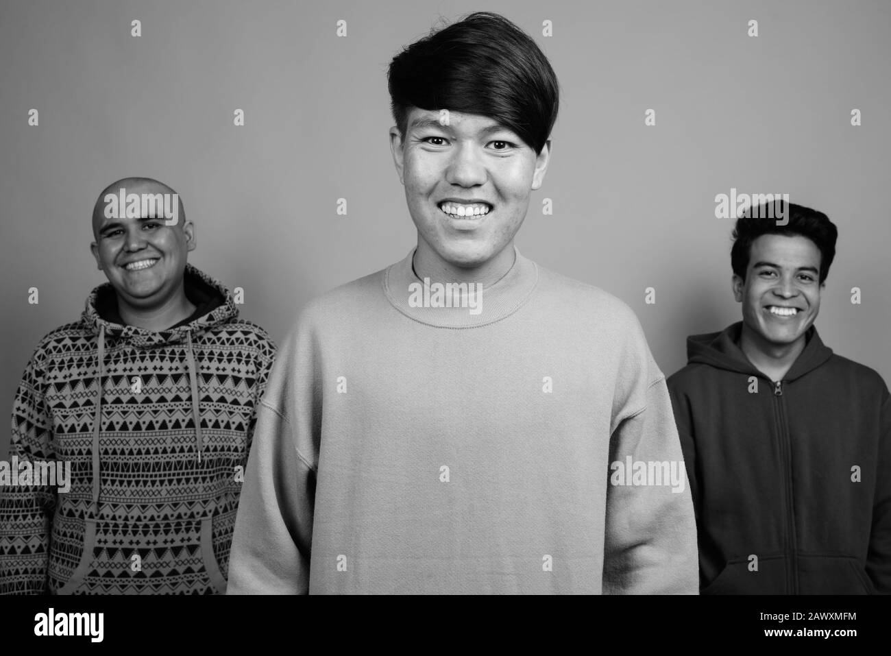Three asian young men Black and White Stock Photos & Images - Alamy