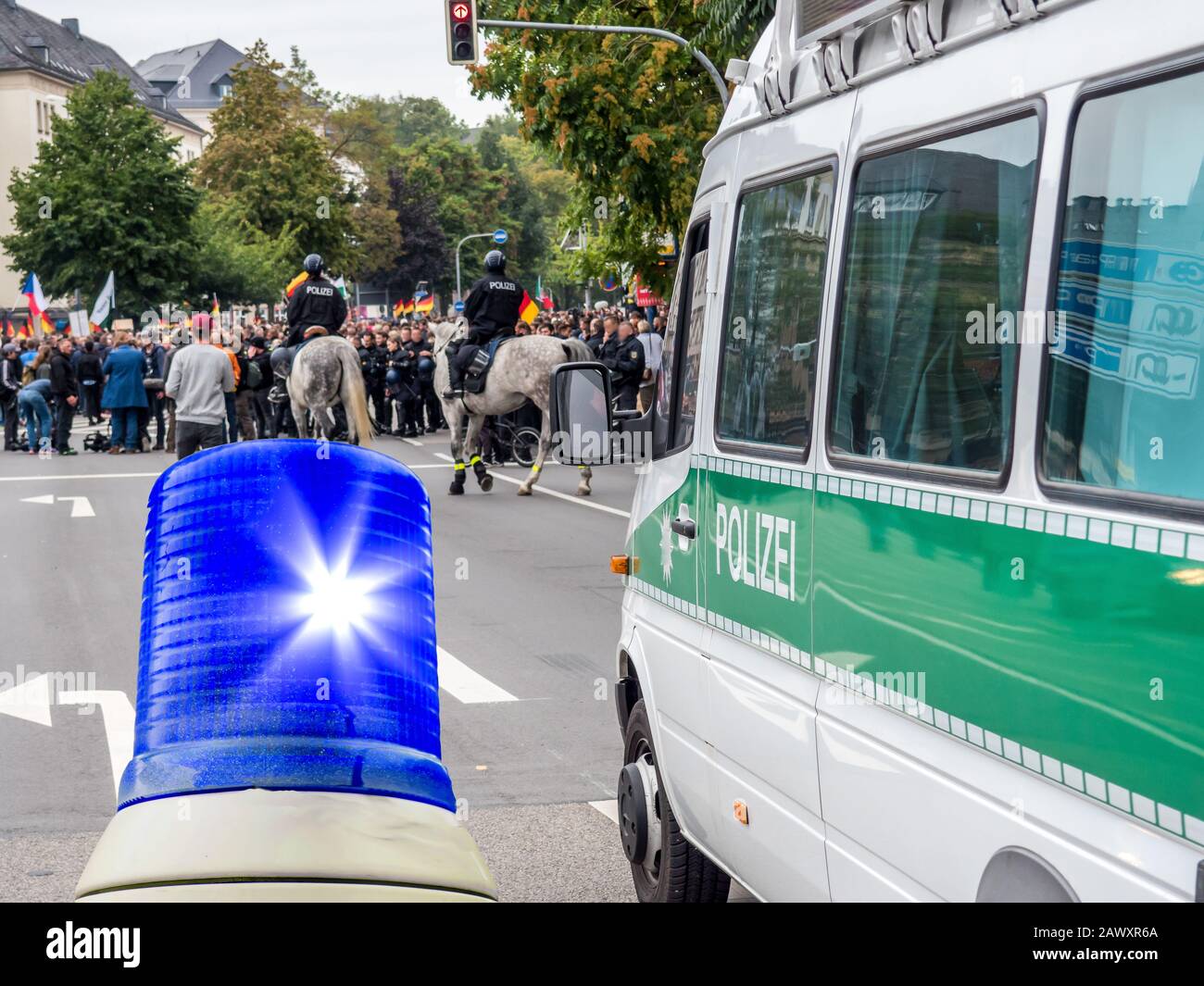Police operation with flashing lights during a demonstration Stock ...