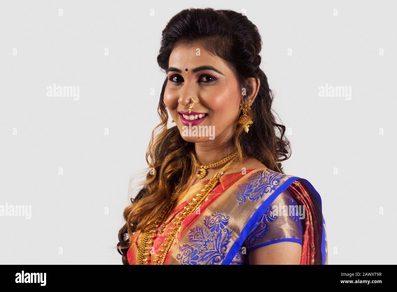 Indian Model wearing traditional Maharashtrian silk saree smiling and ...