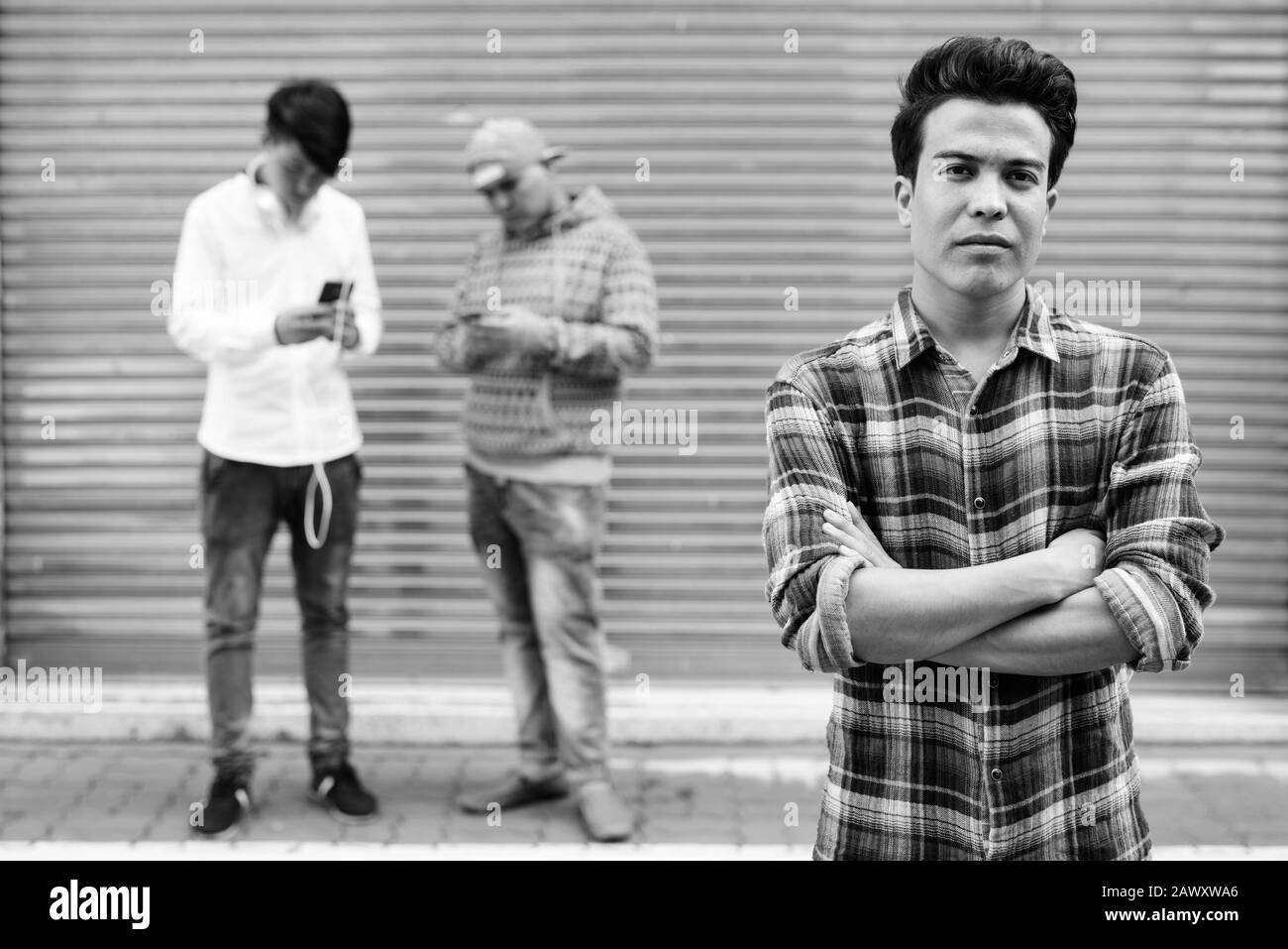 Three men standing together full body Black and White Stock Photos ...