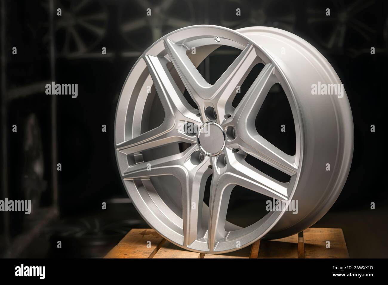 alloy wheel silver, rim new car wheel on a black background Stock Photo ...