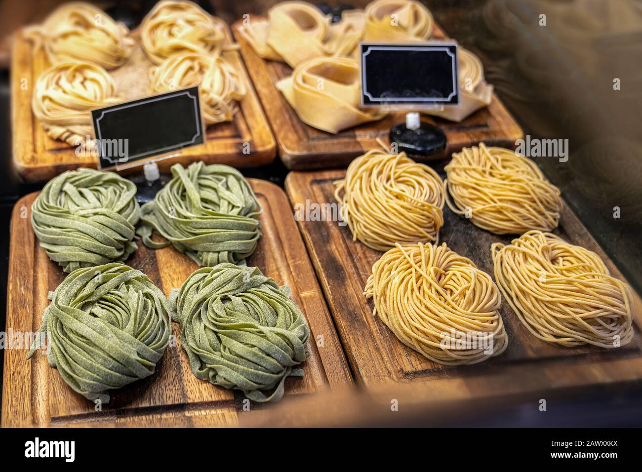 Closeup of raw fresh homemade green pasta tagliatelle. fresh italian ...