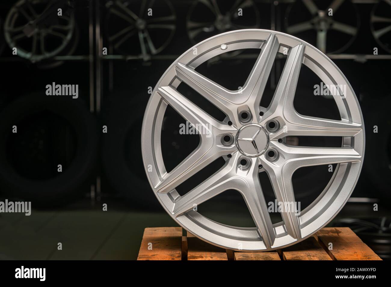 Mercedes Benz logo aluminum cast wheel, close-up, original silver wheel ...