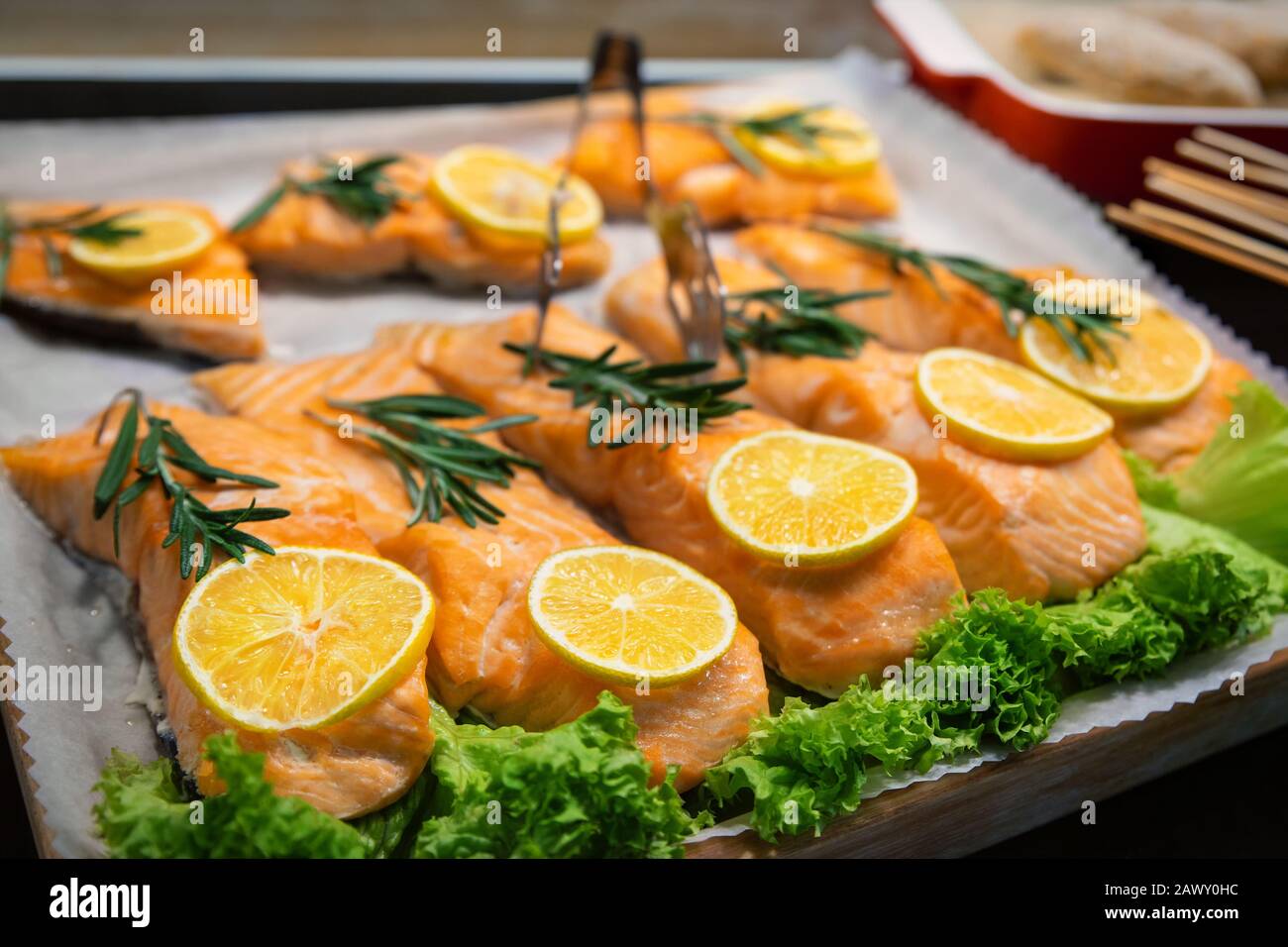 Cafe fast food display counter with tray of baked grilled tasty healthy ...