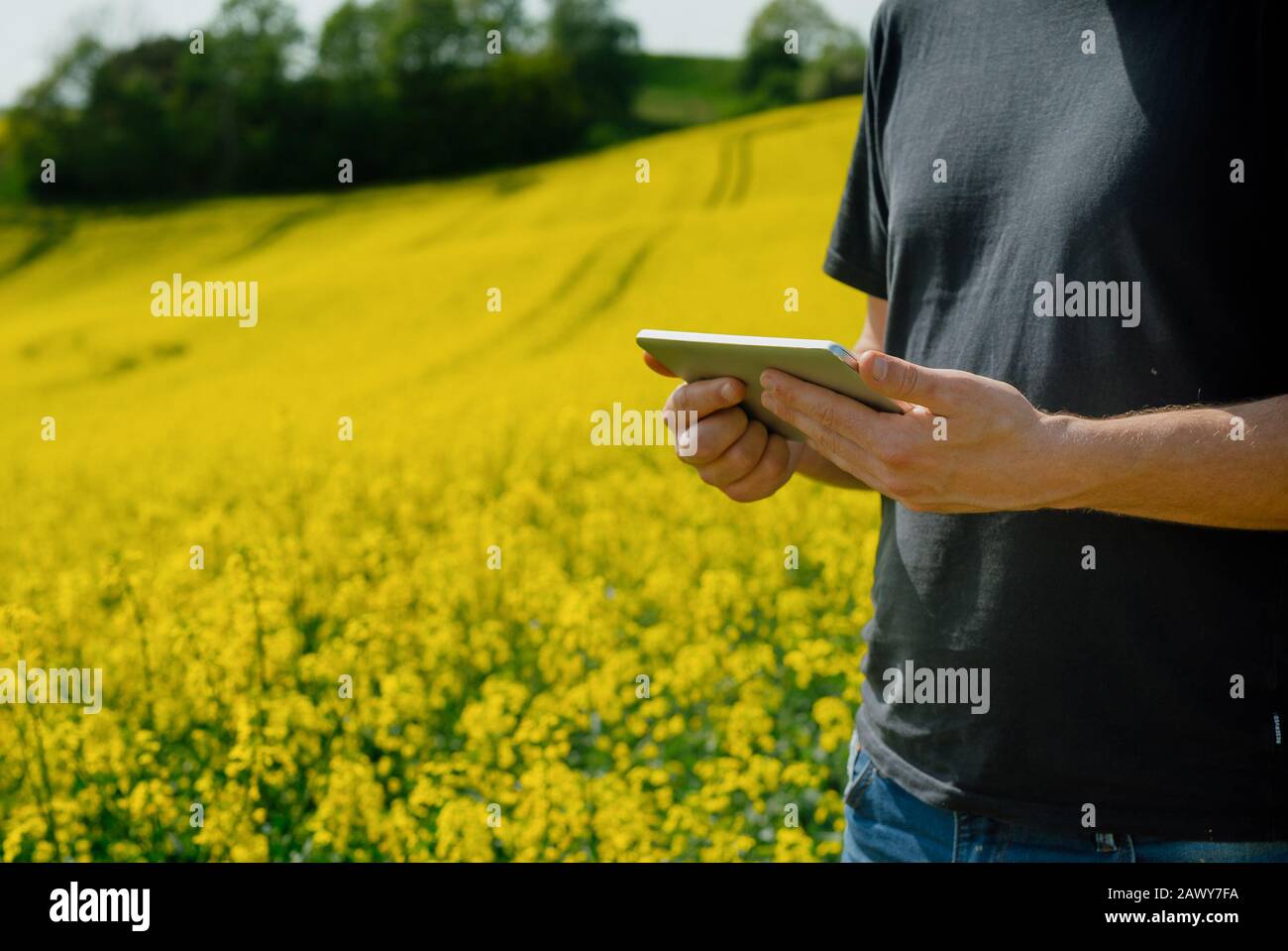 Agriculture Farmer holding tablet Stock Photo - Alamy