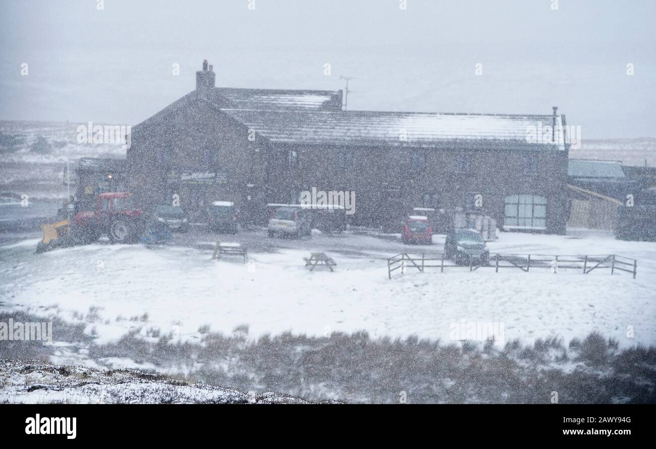 Snowy conditions at the Tan Hill Inn in Reeth in the Yorkshire Dales ...