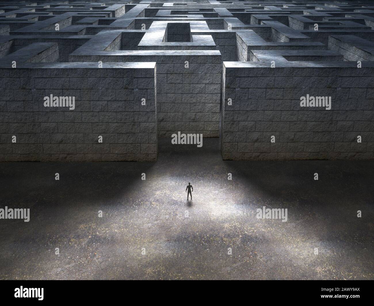 Man standing at the entrance of a huge stone maze. Business and life ...