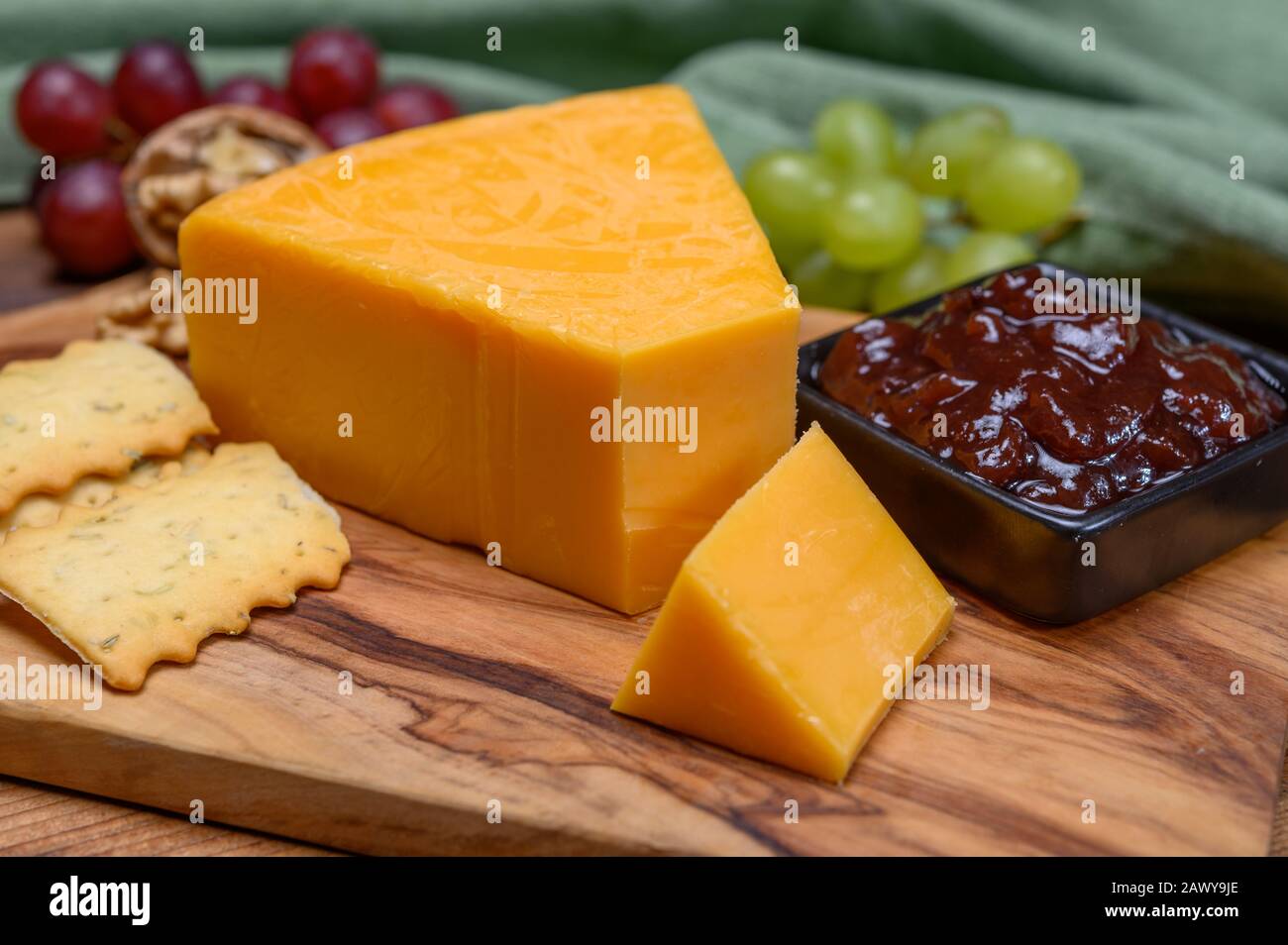 Cheese collection, yellow matured cheddar cheese triangle piece from ...