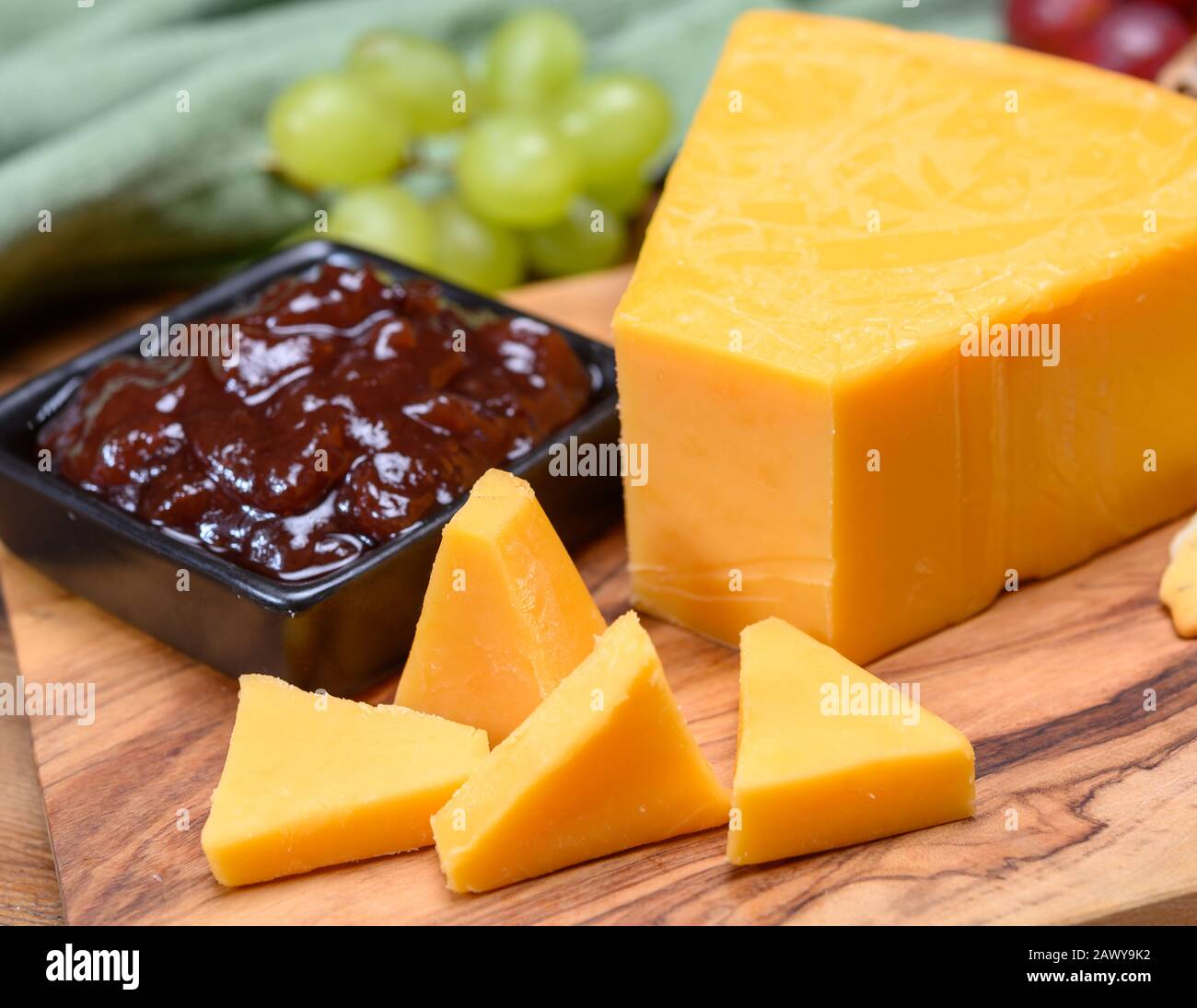 Cheese collection, yellow matured cheddar cheese triangle piece from ...
