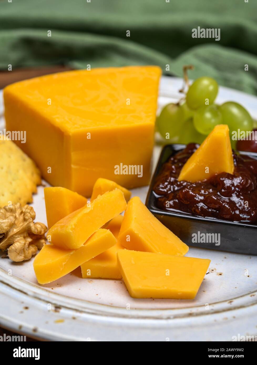 Cheese collection, yellow matured cheddar cheese triangle piece from ...