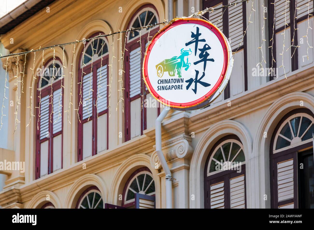 Chinatown sign against the local traditional architecture of windows ...
