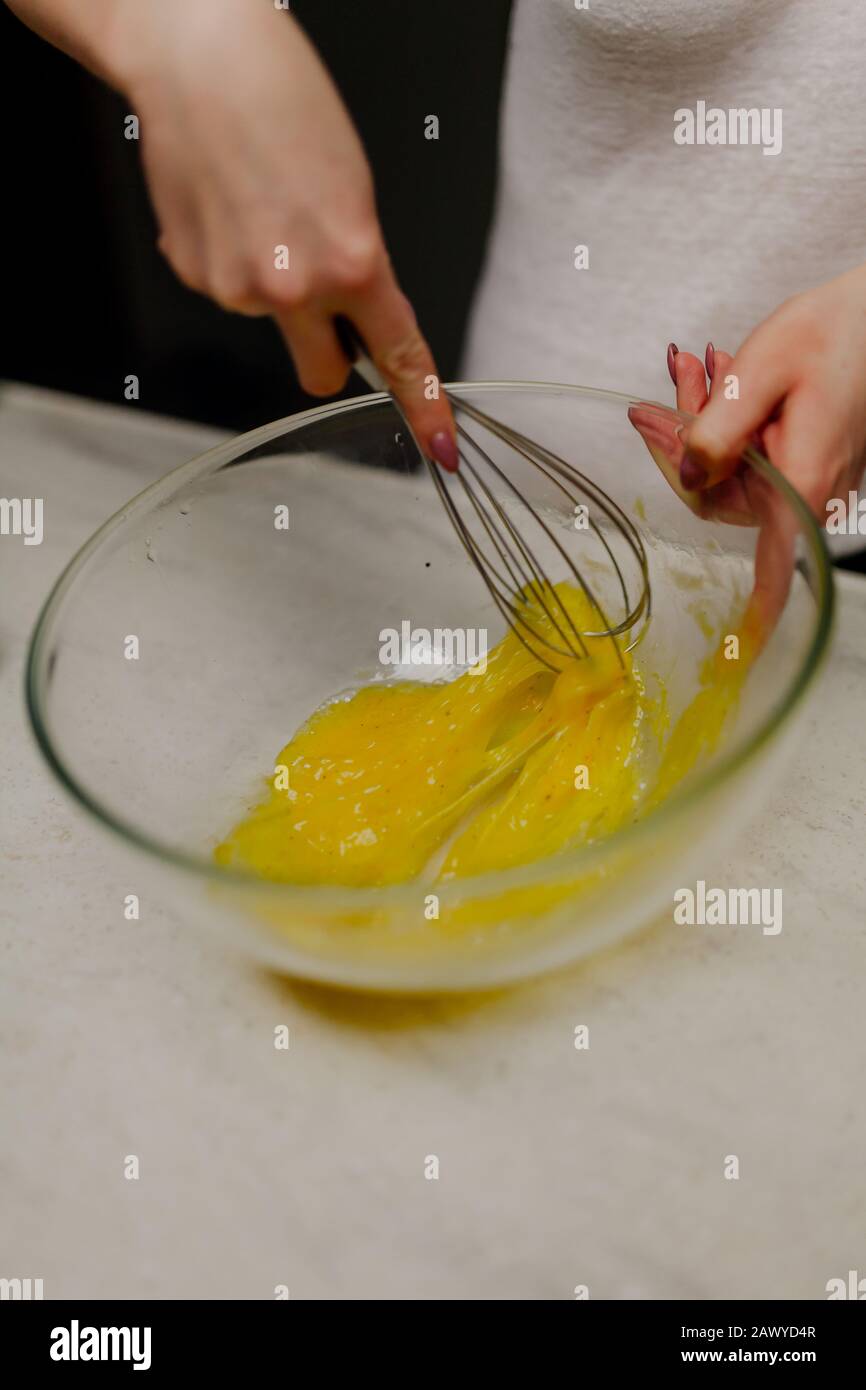 Mixing eggs flour milk in hi-res stock photography and images - Alamy