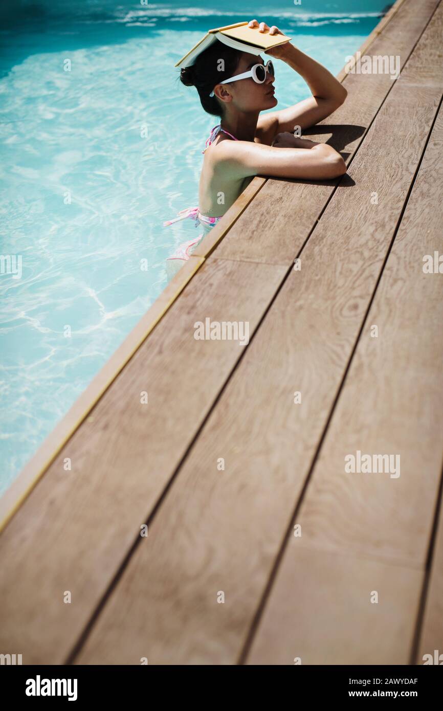 Woman standing in swimming pool hi-res stock photography and images - Alamy