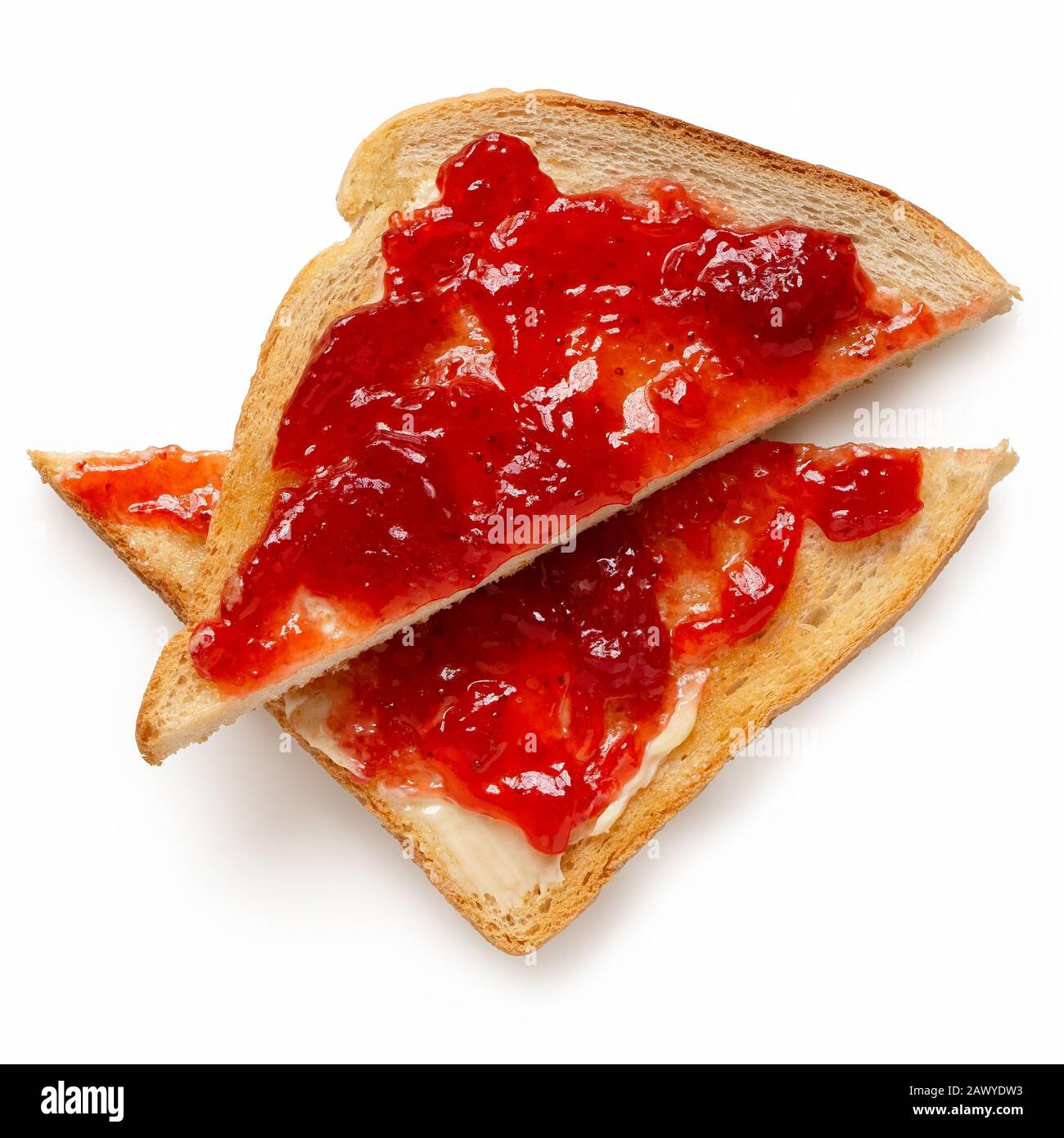 Two triangles of white toast spread with butter and strawberry jam ...