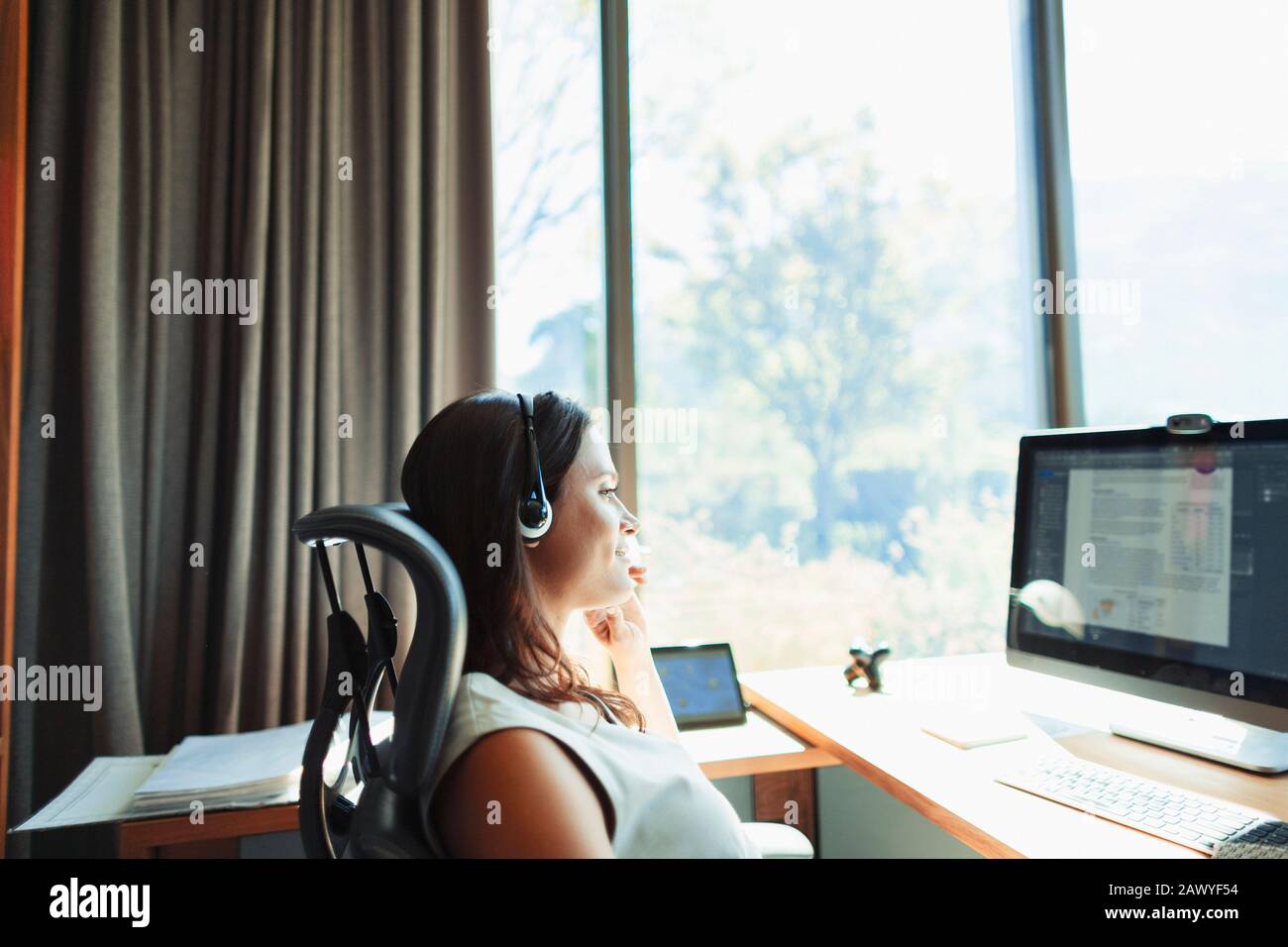 Working home computer with headset hi-res stock photography and images ...