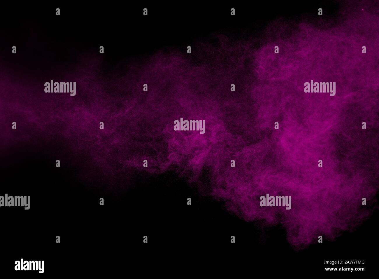 Purple color powder explosion cloud on black background.Purple dust ...