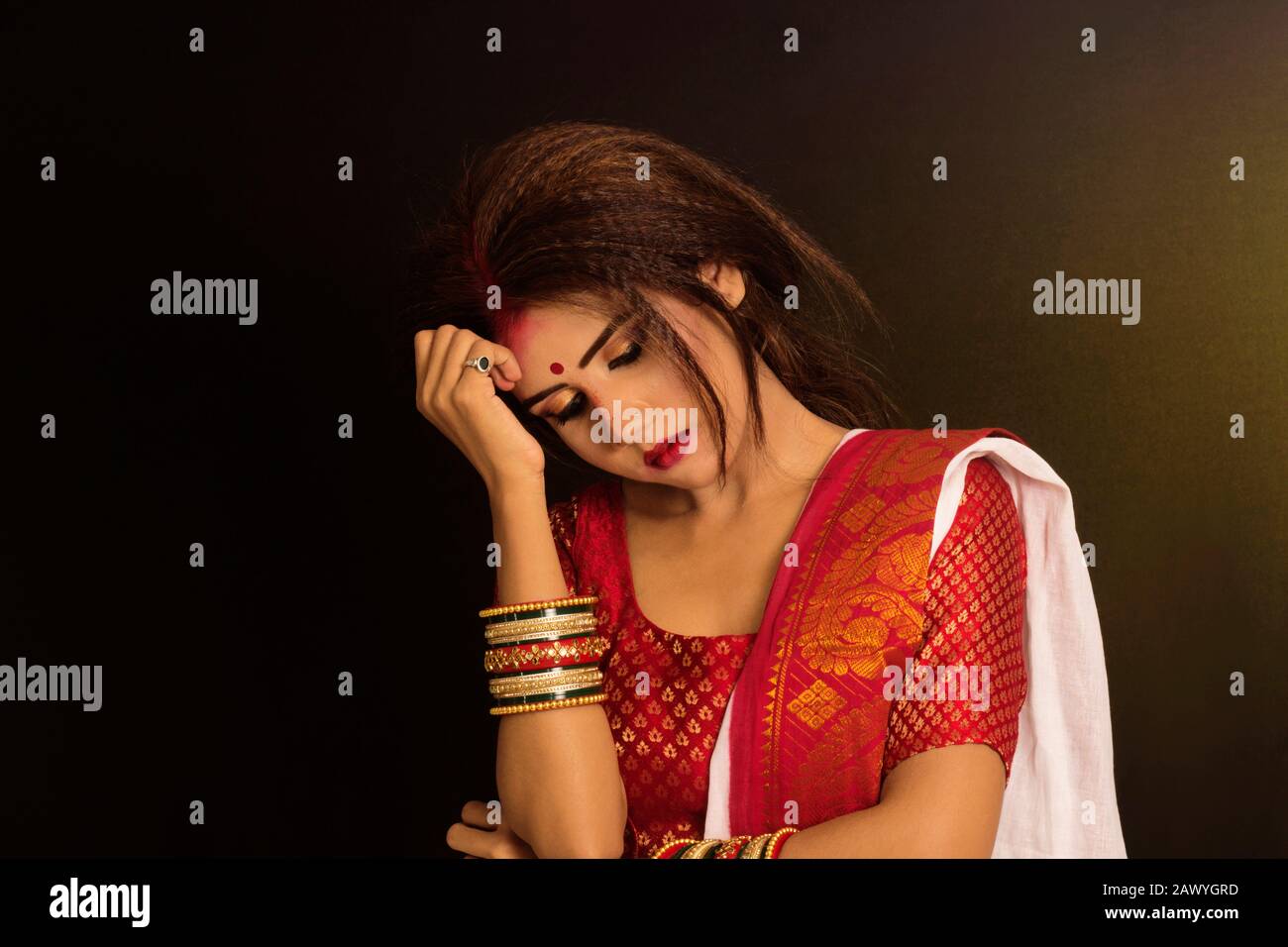 Portrait of an young and beautiful Indian Bengali brunette woman with ...