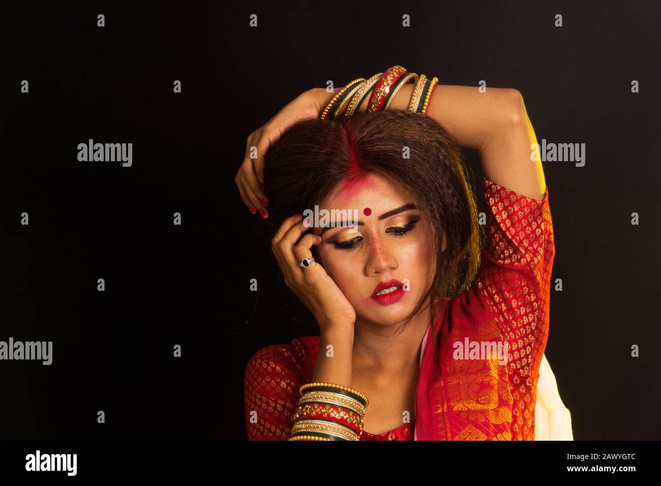 Portrait of an young and beautiful Indian Bengali brunette woman with ...