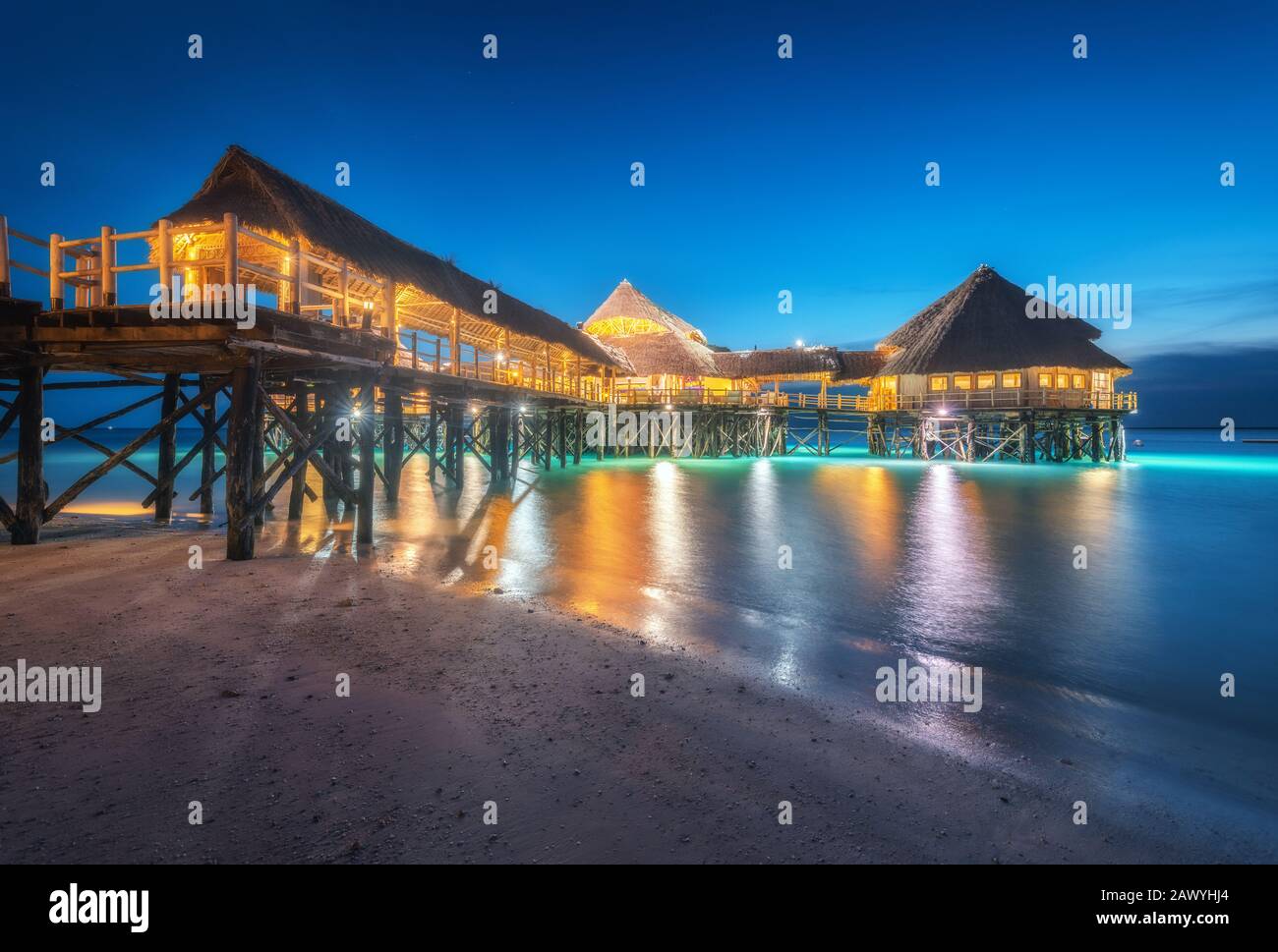 Beautiful wooden restaurant on the water in summer night Stock Photo ...