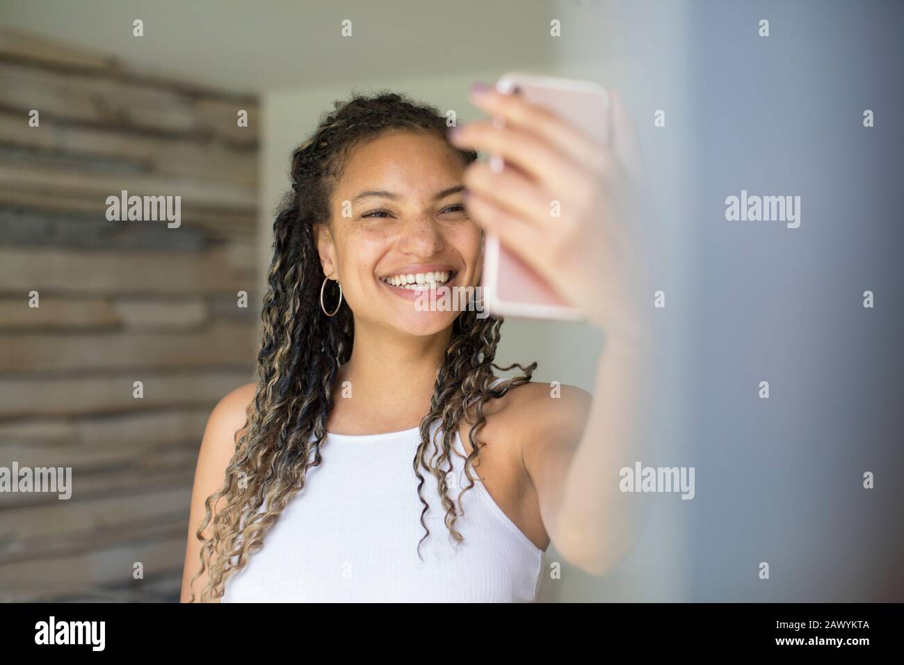 Young woman posing for camera hi-res stock photography and images - Alamy