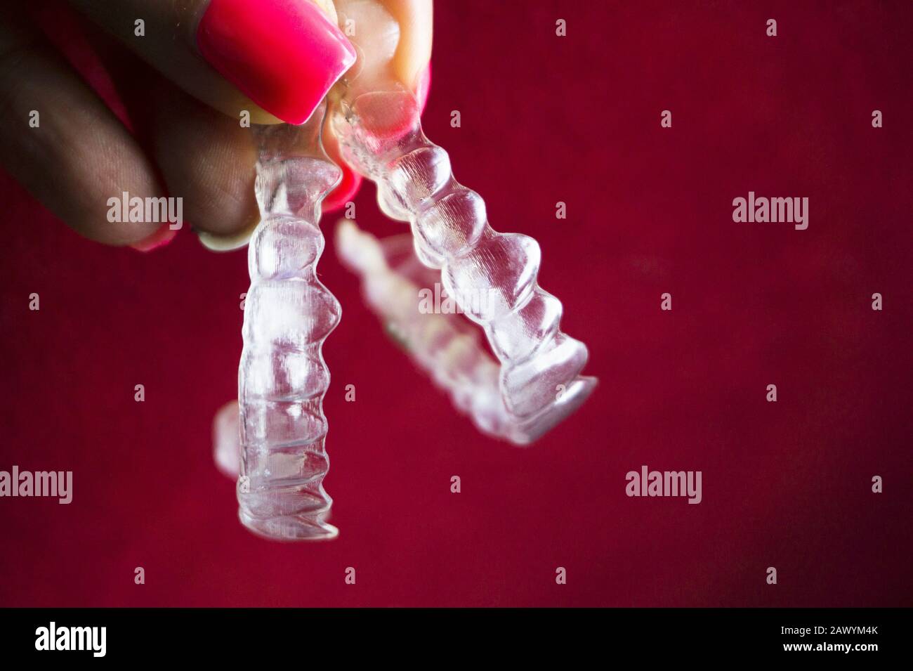 Invisible dental retainer held hi-res stock photography and images - Alamy
