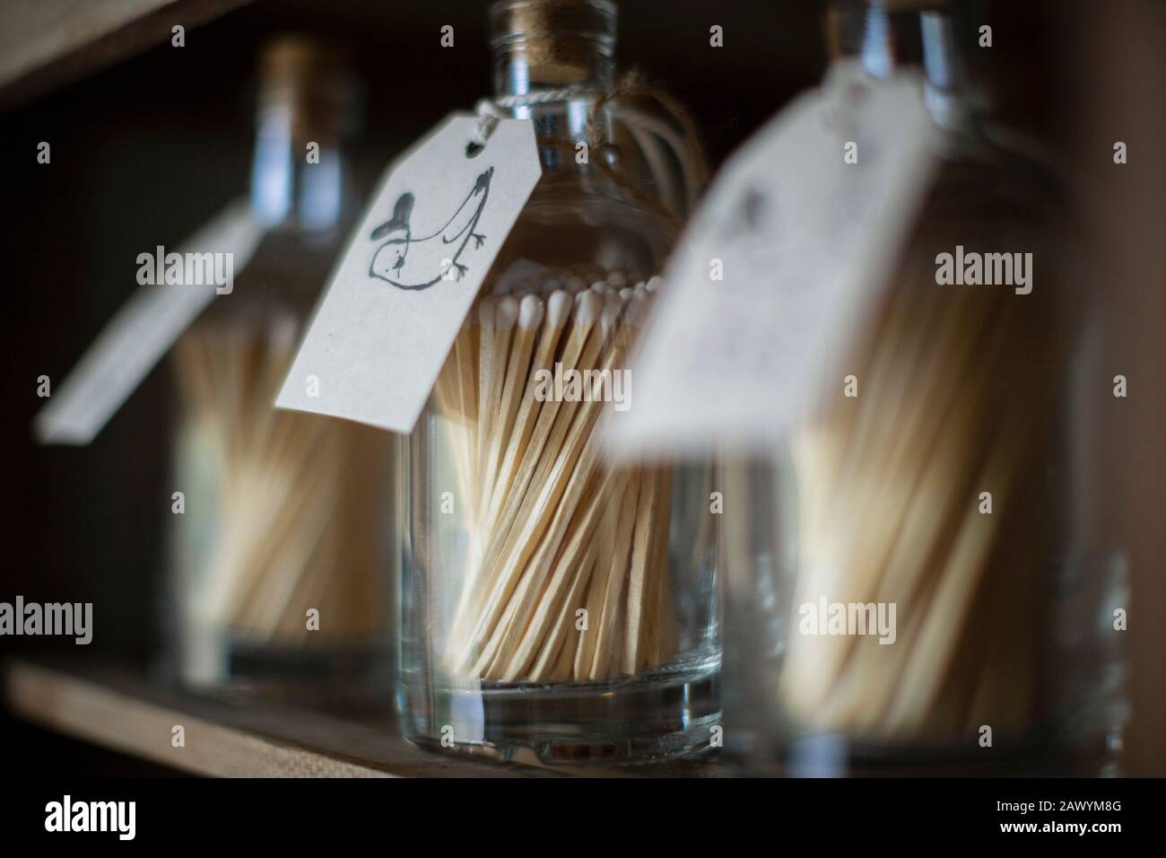 Close up matchstick bottles with bird labels on retail shelf Stock ...