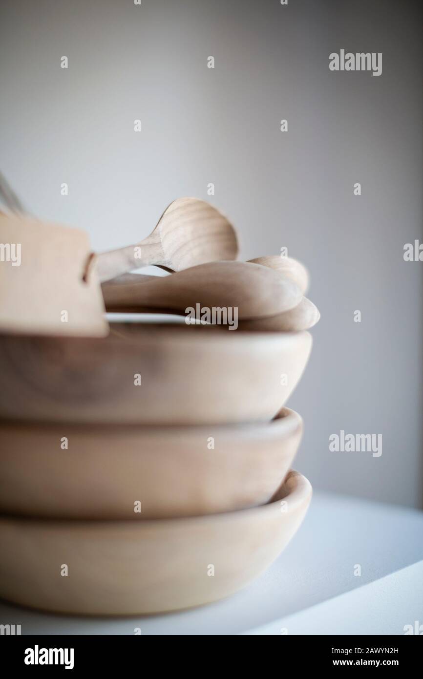 Stacked wooden bowls and spoons Stock Photo - Alamy