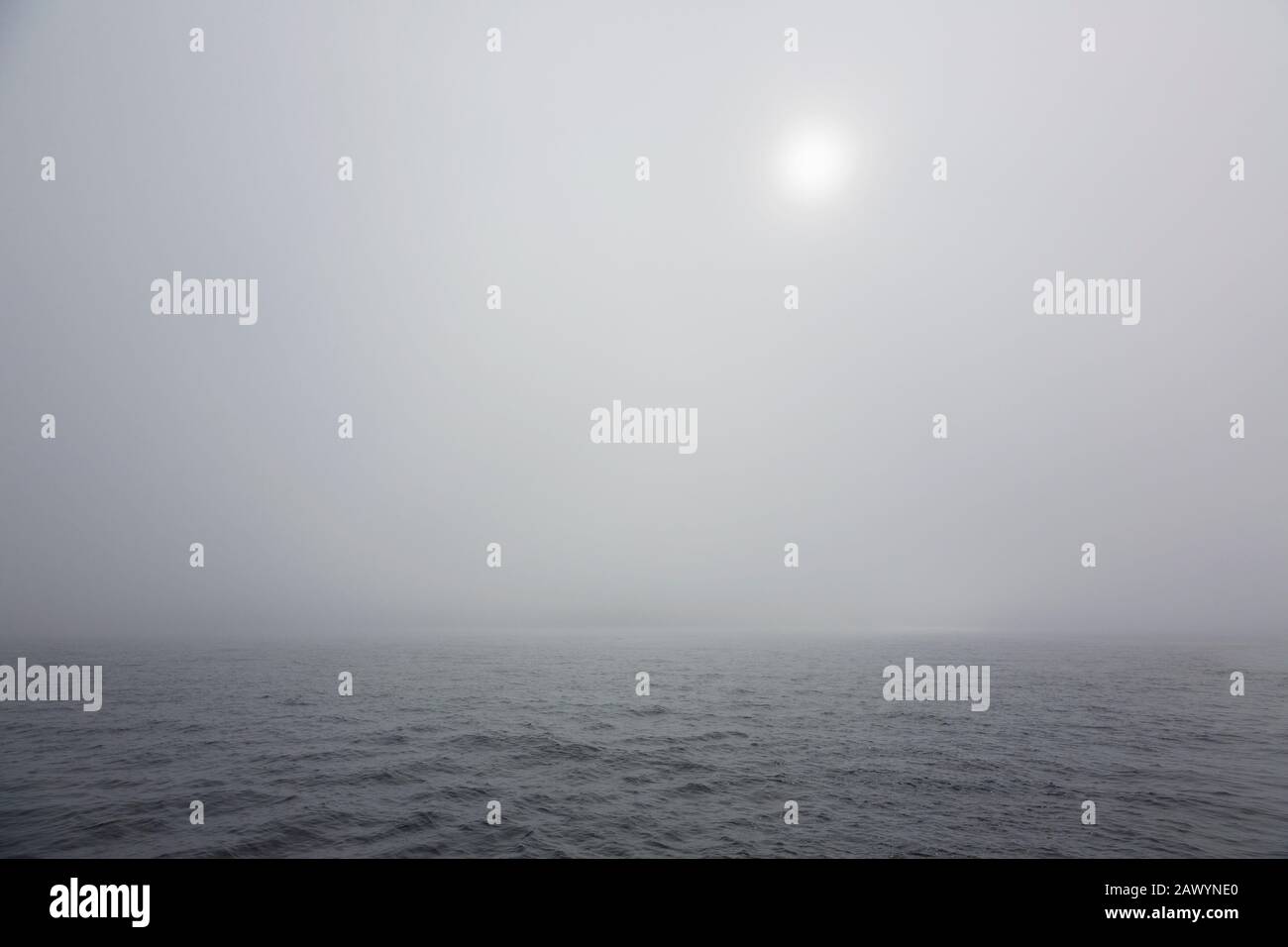 Thick gray fog over ethereal Atlantic Ocean Stock Photo - Alamy