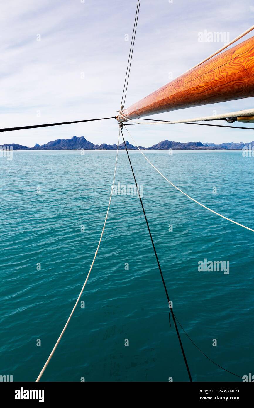 Sailboat mast over sunny blue Atlantic Ocean Stock Photo - Alamy