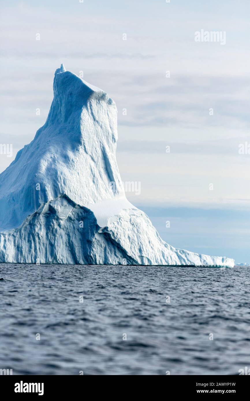 Majestic iceberg formation on sunny Atlantic Ocean Greenland Stock ...