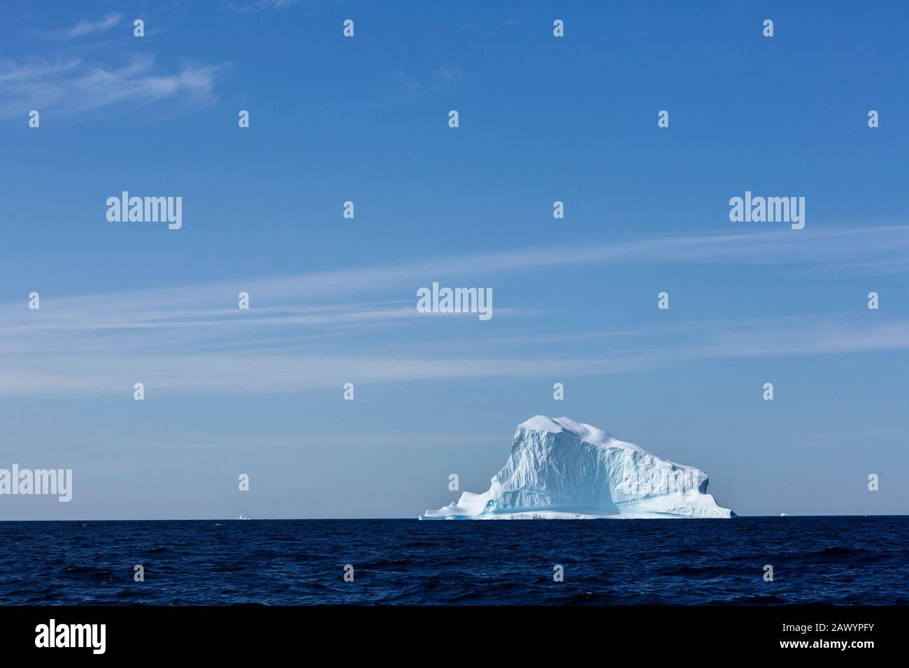Majestic iceberg formation on sunny blue Atlantic Ocean Greenland Stock ...