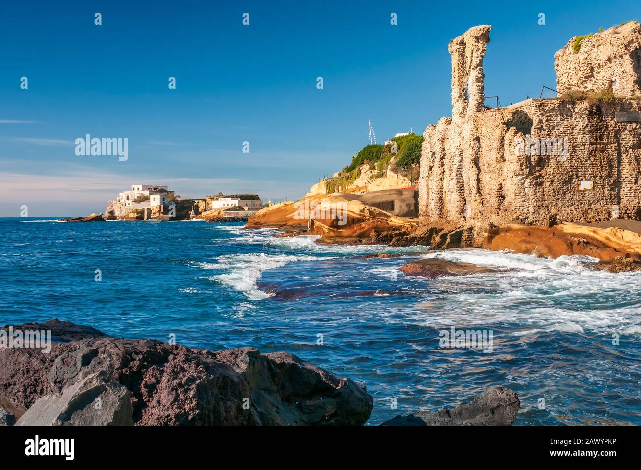 Seaside and historic buildings in Napoli bay. Summer vacation in Italy ...