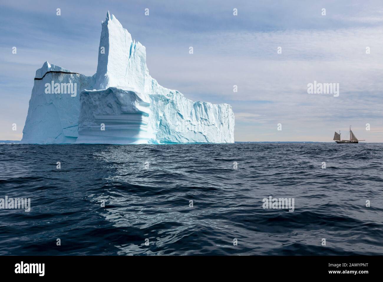 Majestic iceberg formation on sunny blue Atlantic Ocean Greenland Stock ...