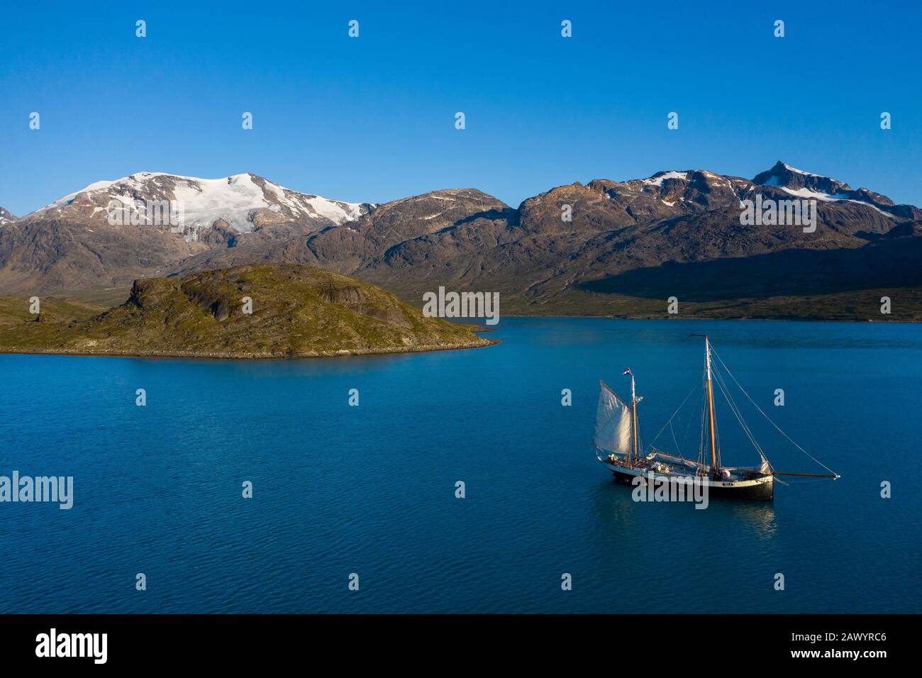 Ship in sunny remote bay Disko Bay West Greenland Stock Photo - Alamy