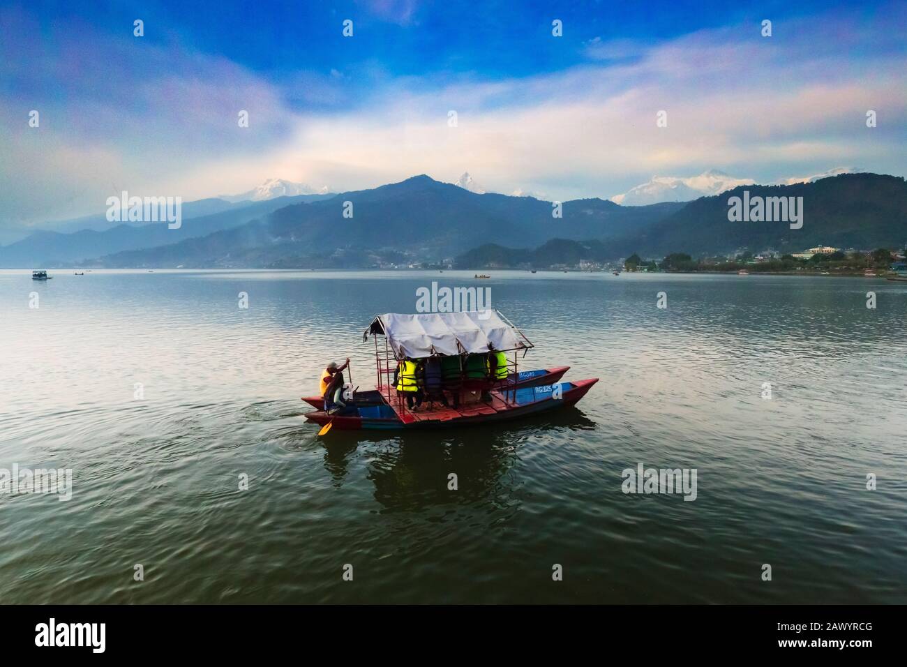 November 28,2018 Phewa Lake Pokhara Nepal. Raw Boat with tourists on ...