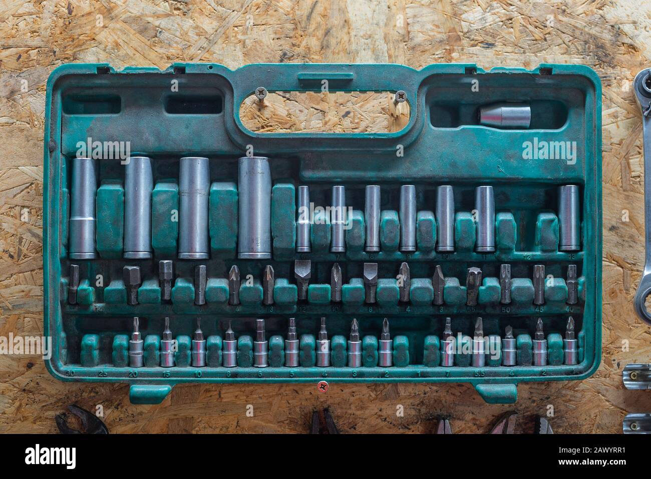 a set of socket wrenches in a plastic box in a workshop Stock Photo - Alamy