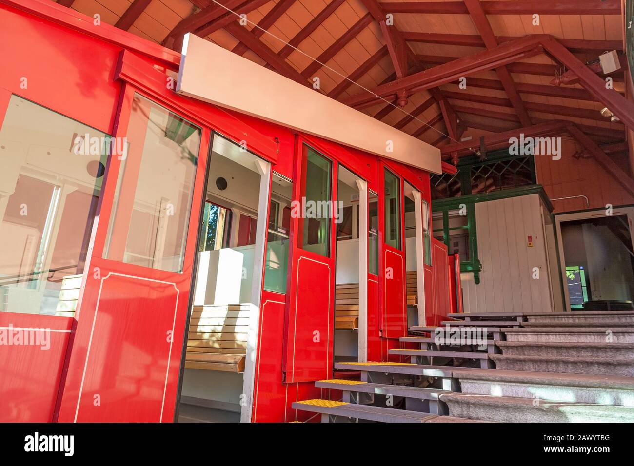 Ropeway, summit station with red cable car - roof and stairs at ...
