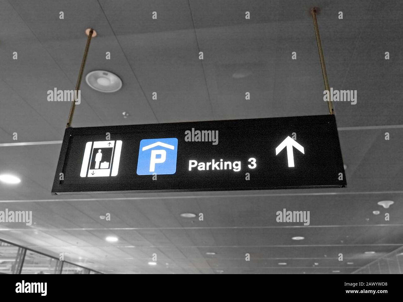 Parking level sign with blue P sign and baggage label at airport Stock ...