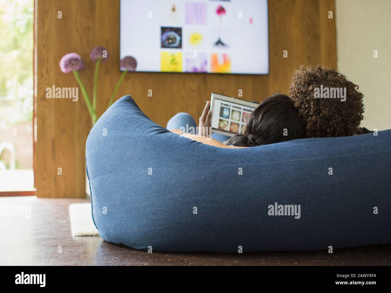 Woman tablet relax streaming hi-res stock photography and images - Alamy