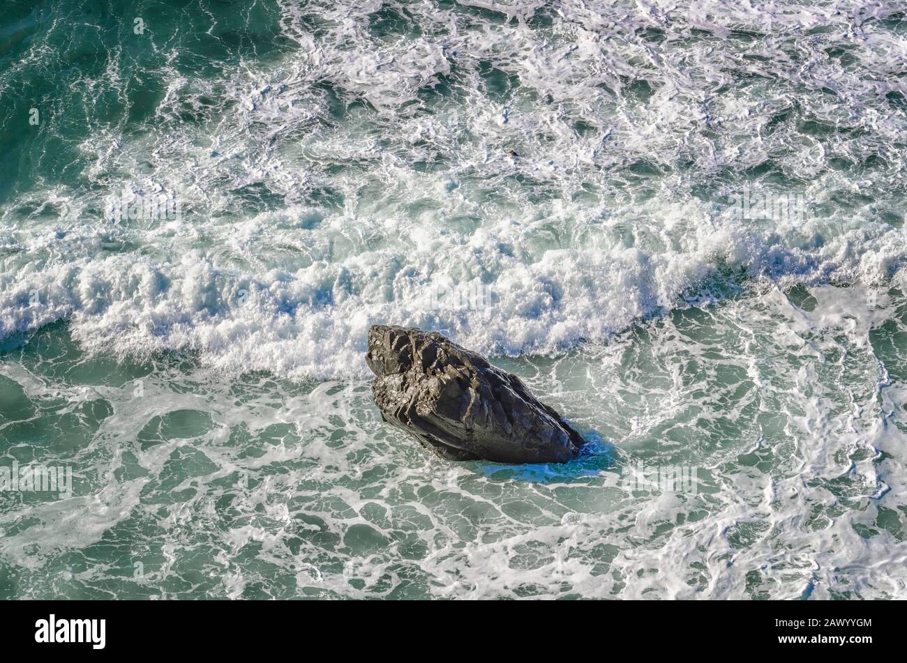Waves crash against a rock, Big Sur, CA Stock Photo - Alamy