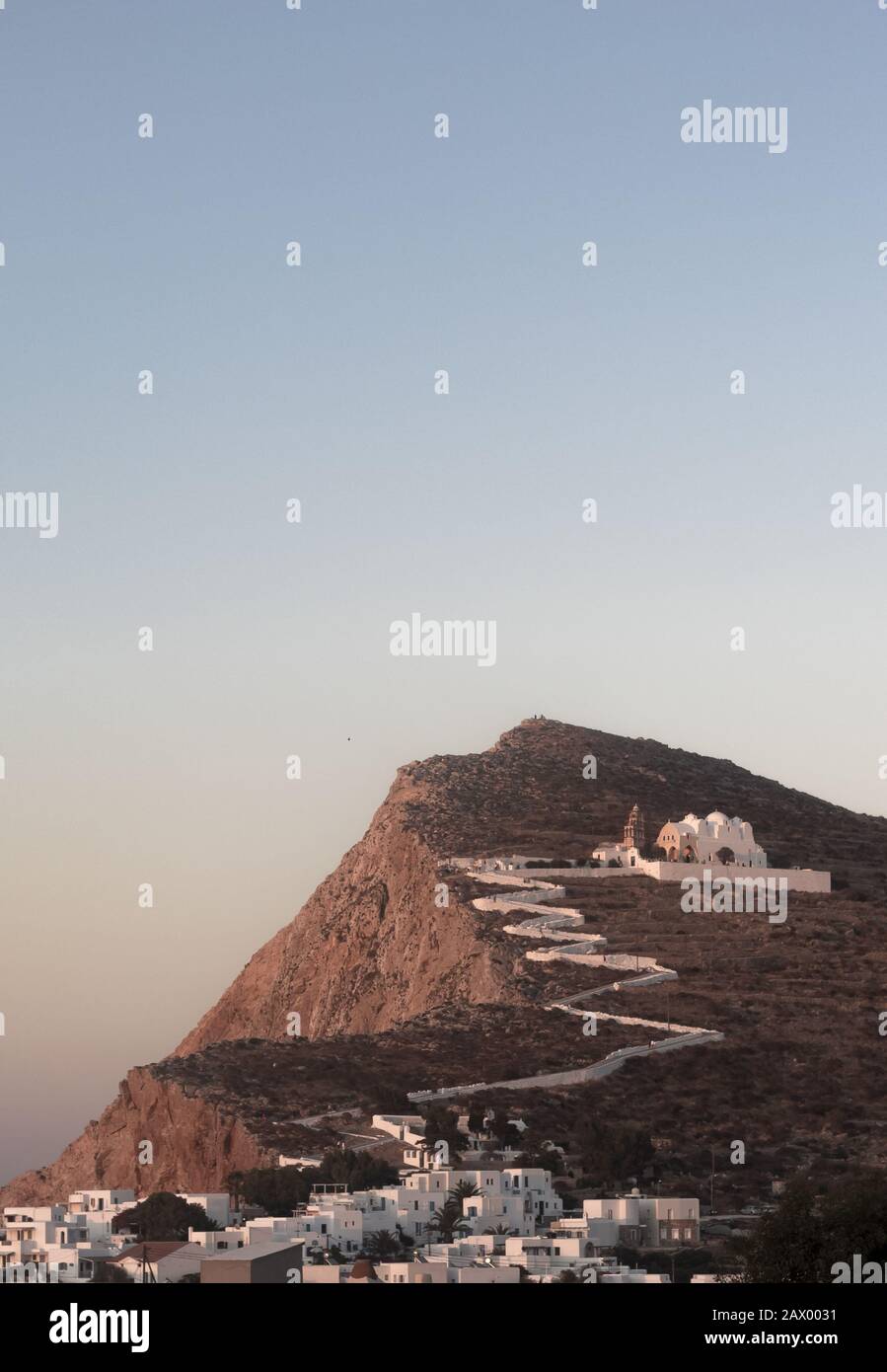 Main church set on a steep hillside above the town in Folegandros ...