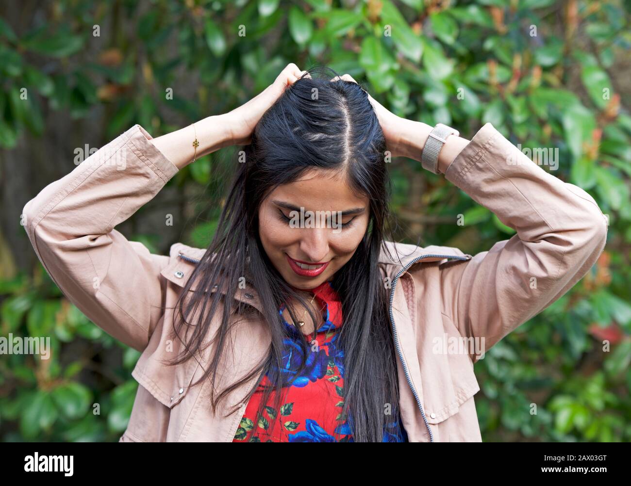 Shy demure young woman hi-res stock photography and images - Alamy
