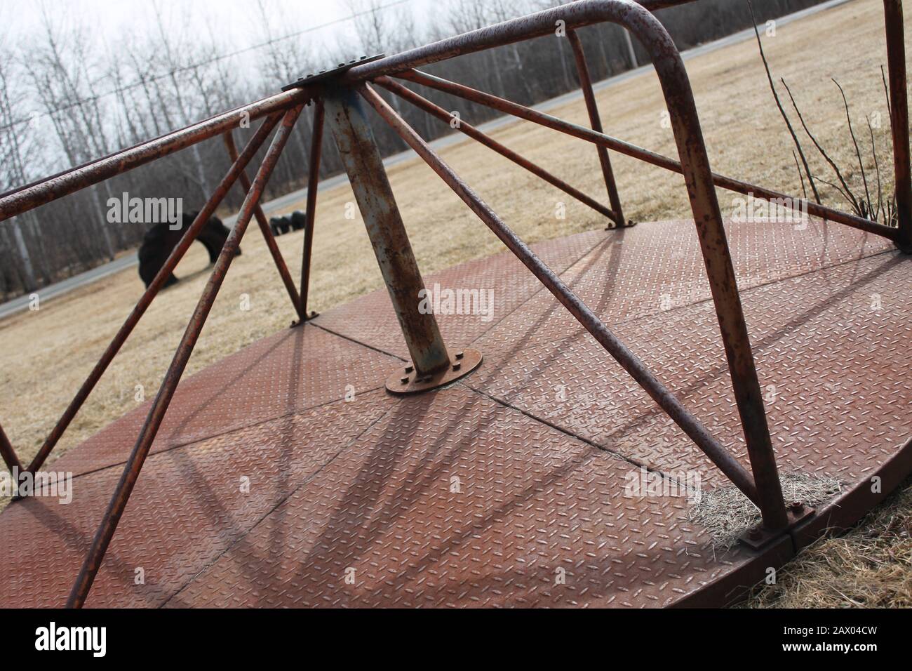 Playground merry go round hi-res stock photography and images - Alamy