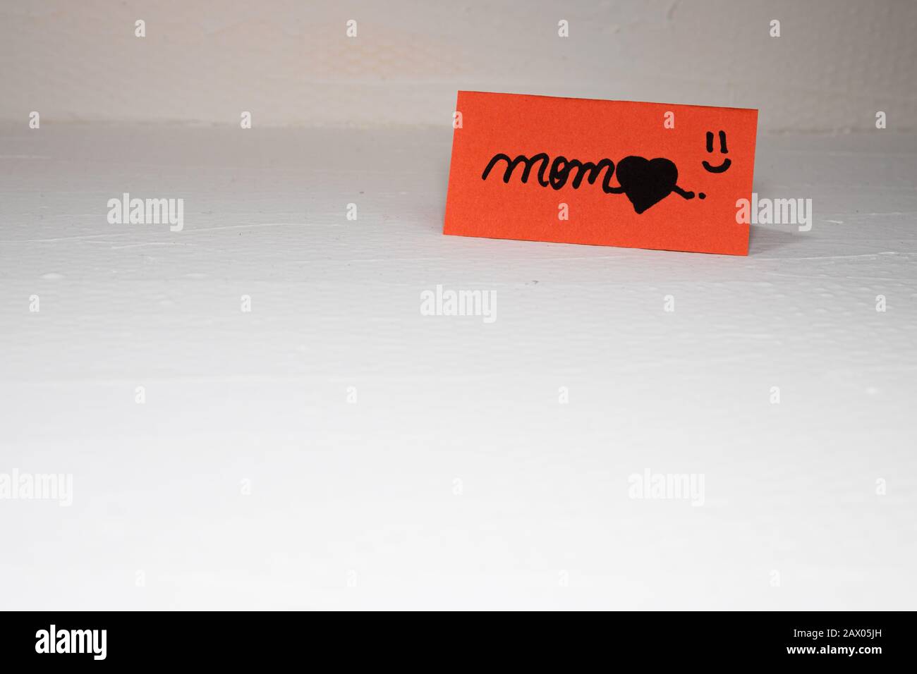 Mom writing love text for mother on paper. Label tag with lovely ...