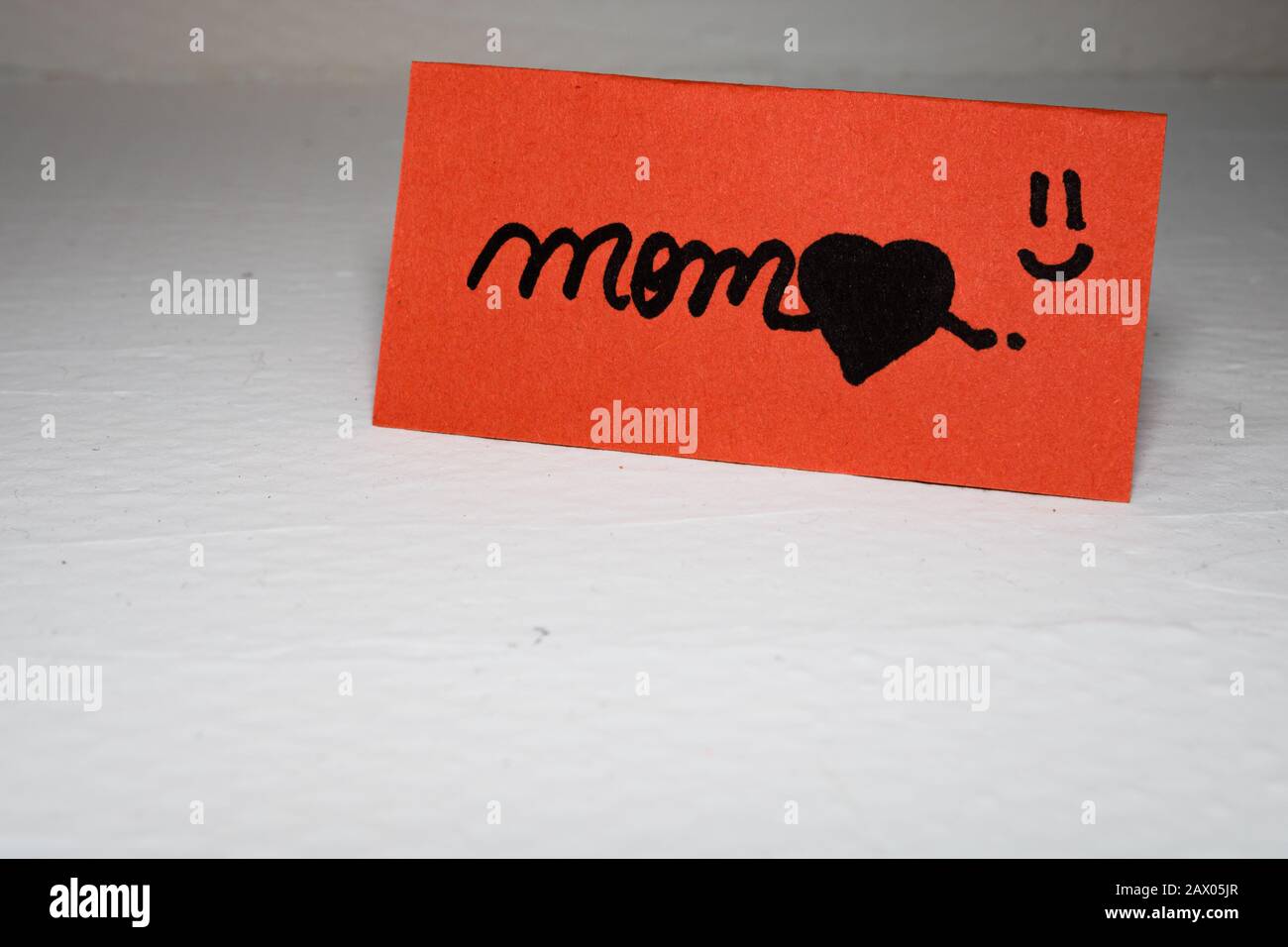 Mom writing love text for mother on paper. Label tag with lovely ...