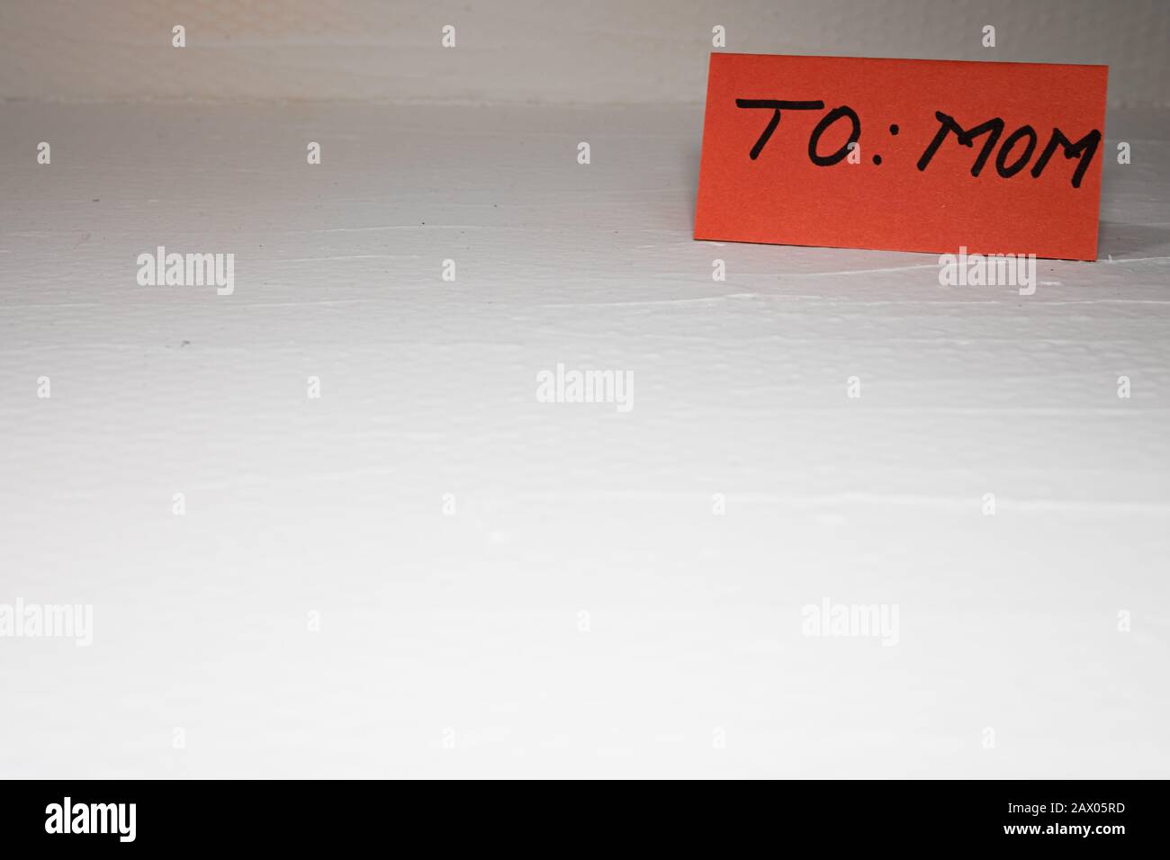 To mom writing love text for mother on paper. Label tag with lovely ...