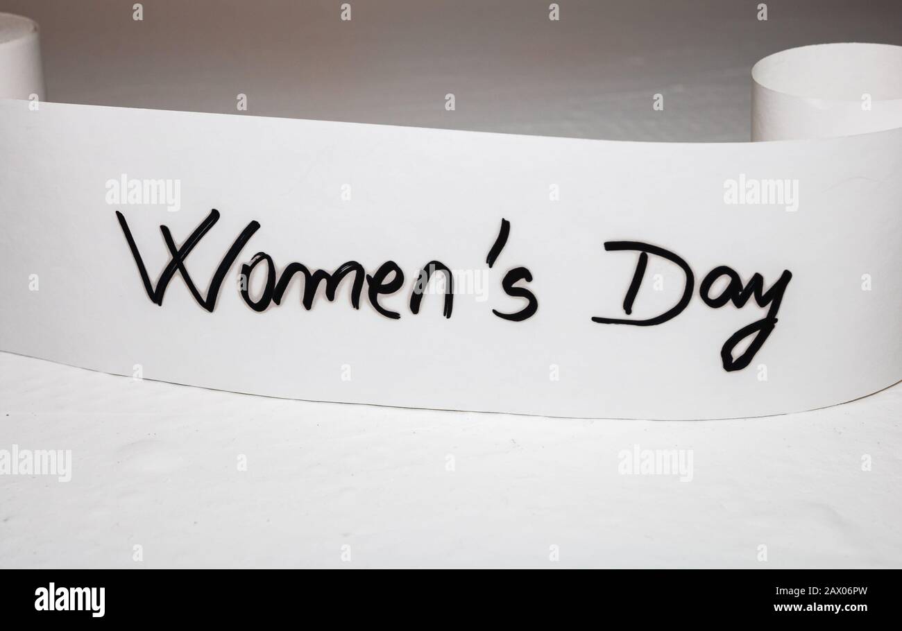 Women`s day writing love text for mother on paper. Label tag with ...